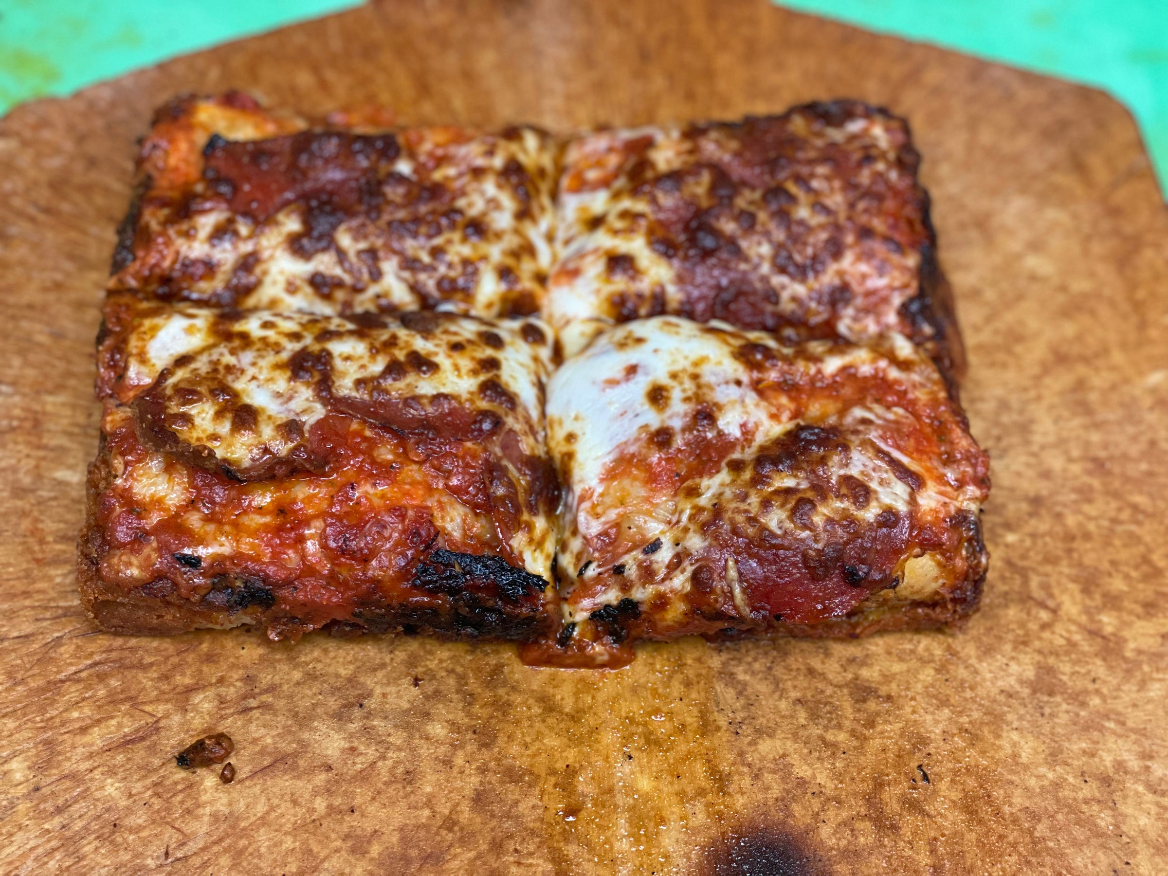 All over our small round pizzas are 12" and cut into 6 slices